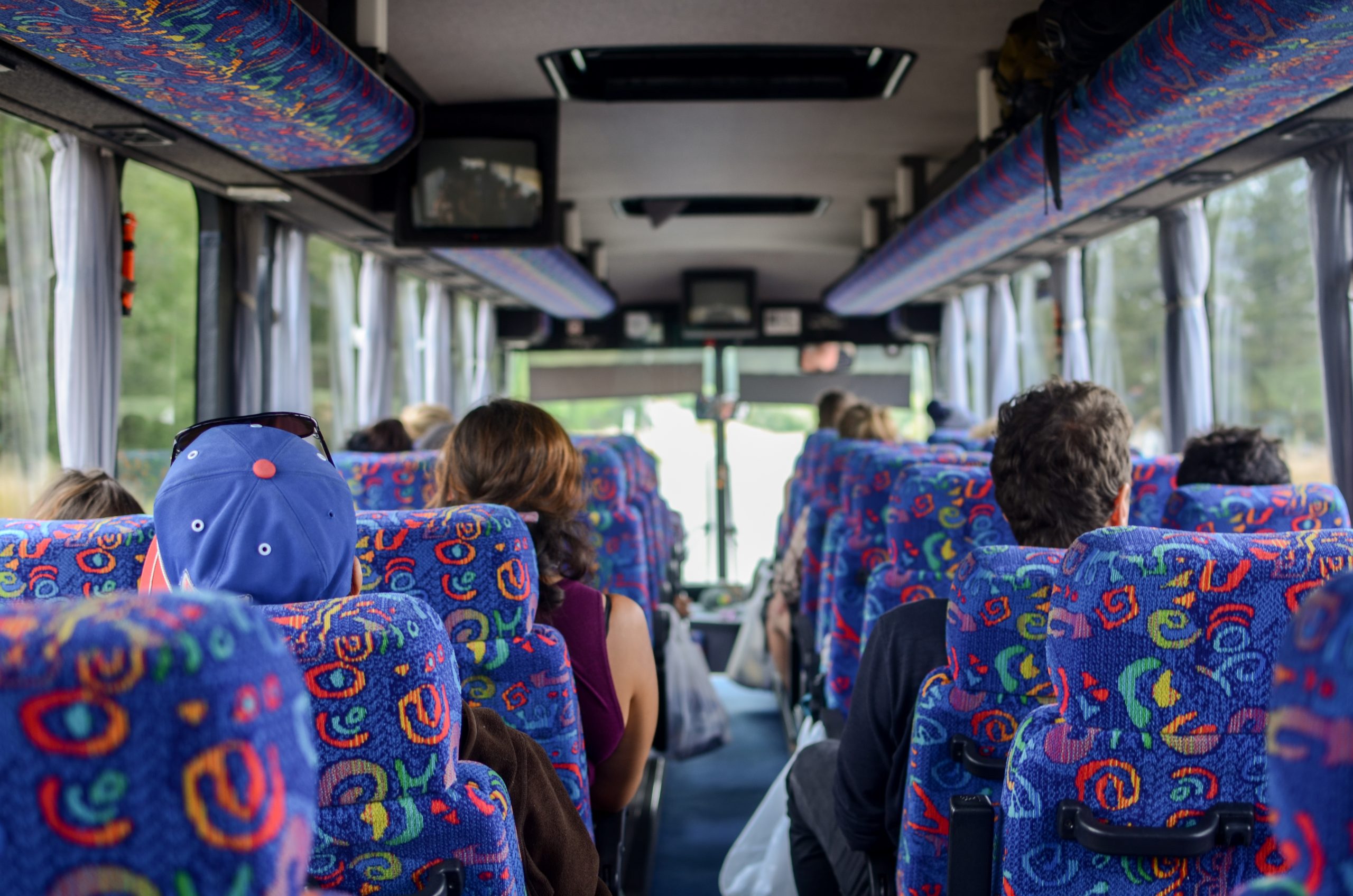 What s The Difference Between A Coach Bus And A Regular Bus 